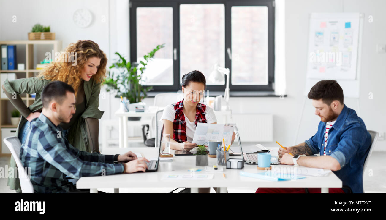 creative team working on user interface at office Stock Photo - Alamy