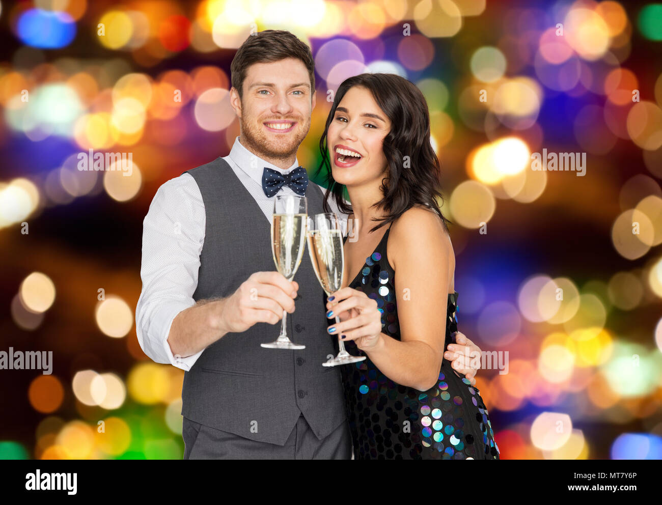 happy couple with champagne glasses at party Stock Photo - Alamy