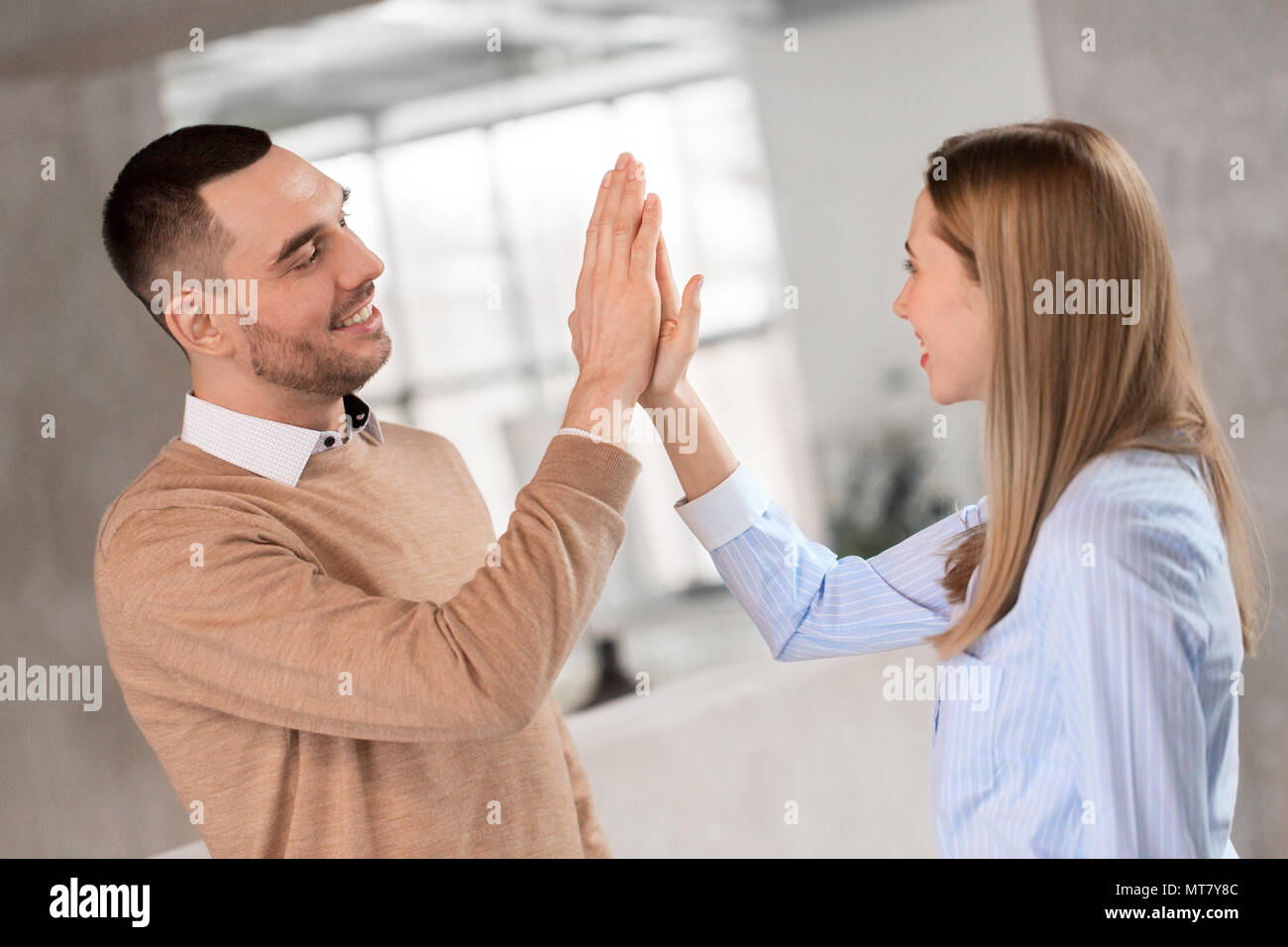 Coworker high five hi-res stock photography and images - Alamy