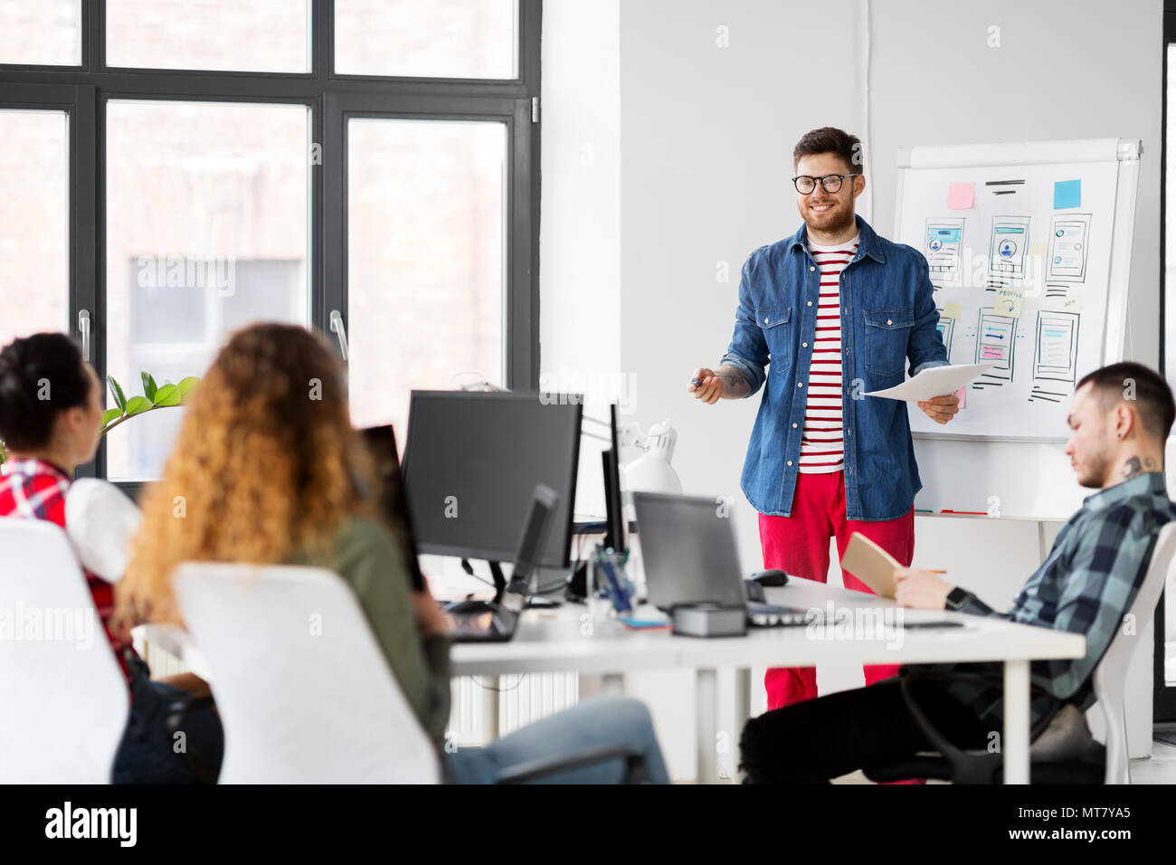 creative man showing user interface at office Stock Photo - Alamy