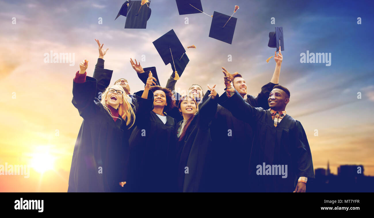 Group happy graduates throwing graduation hi-res stock photography and ...