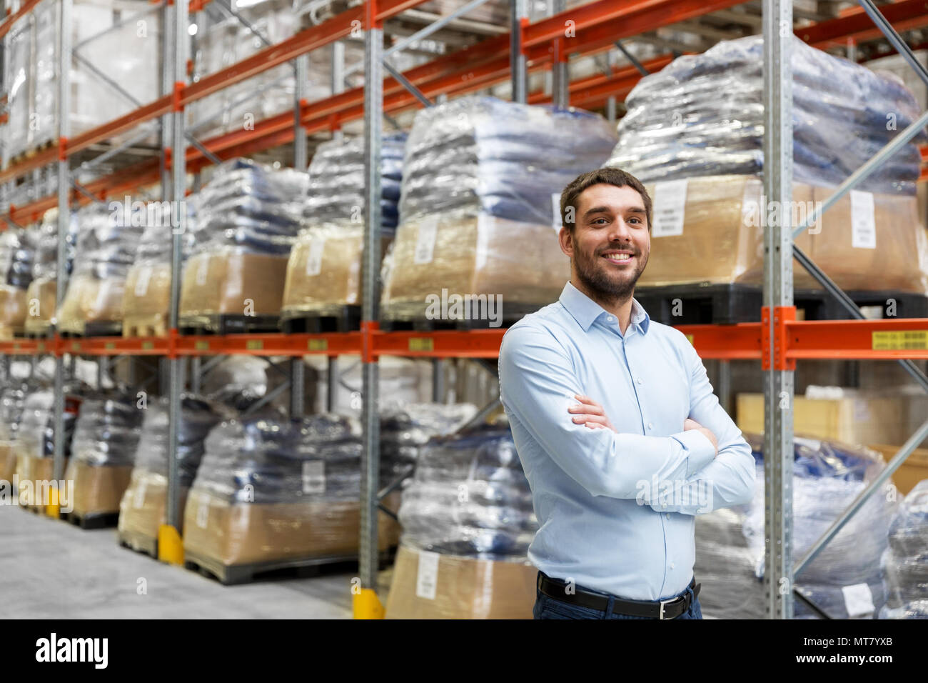 happy businessman at warehouse Stock Photo - Alamy