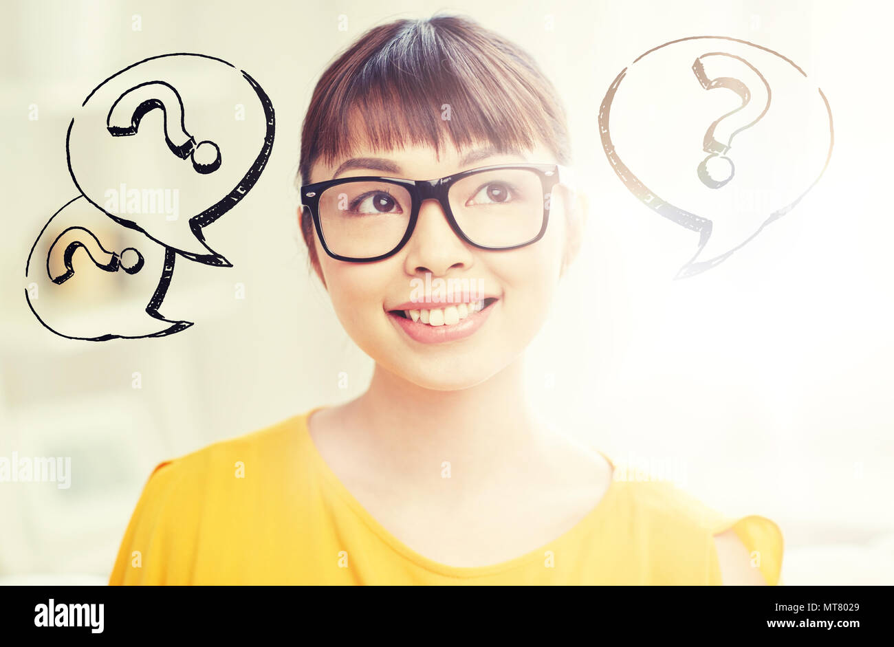 Woman thinking question marks hi-res stock photography and images - Alamy