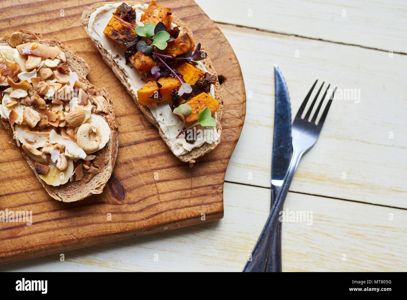 High angle of a variety of delicious open faced sandwiches with an ...