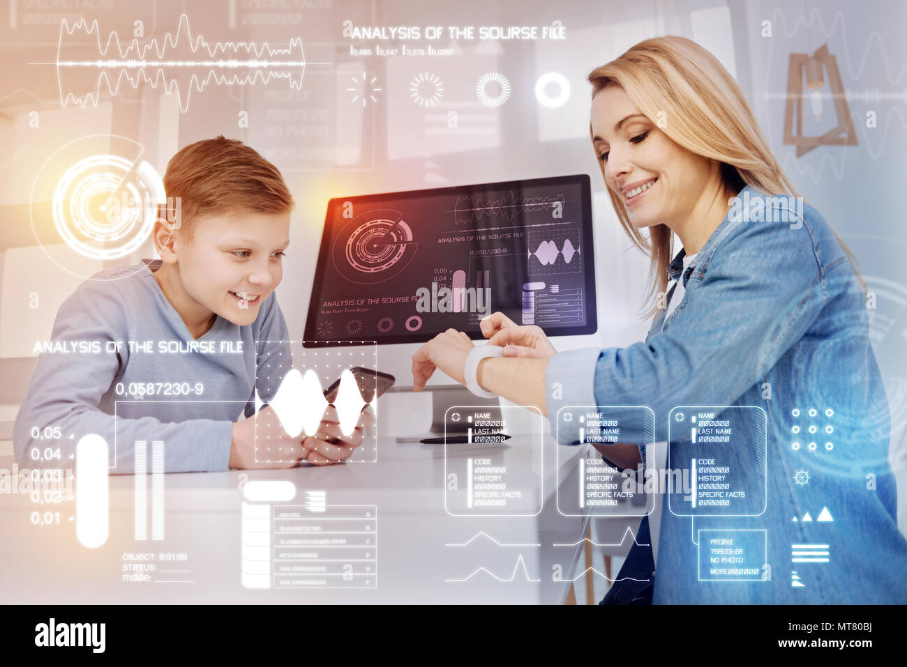 Boy looking watch hi-res stock photography and images - Alamy