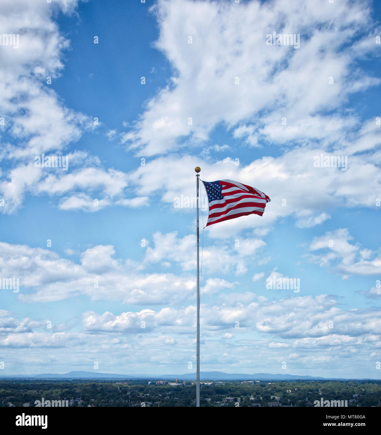 American Flag against Blue Sky and Appalachian Mountains Stock Photo ...