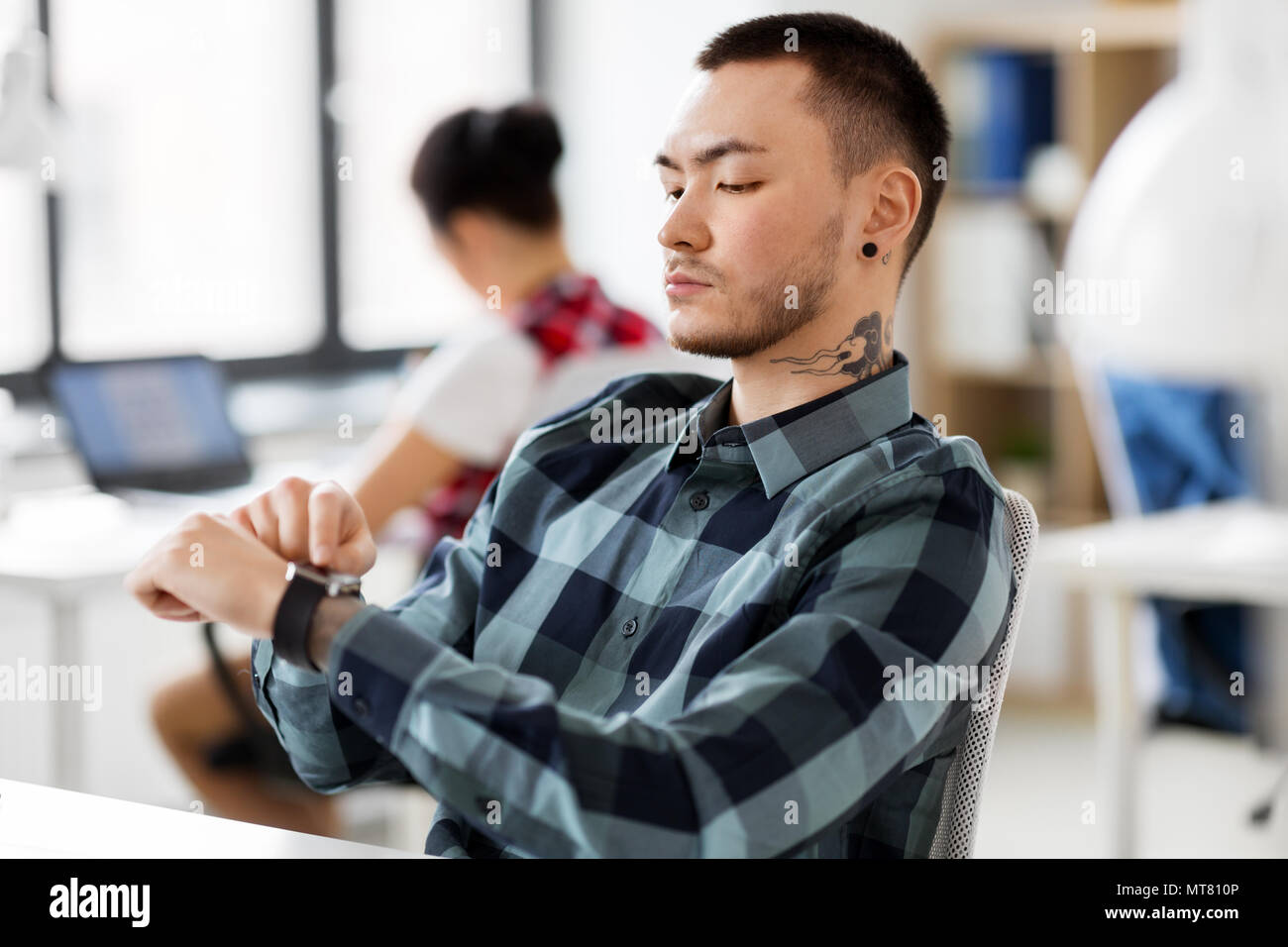 Man with watch hi-res stock photography and images - Alamy