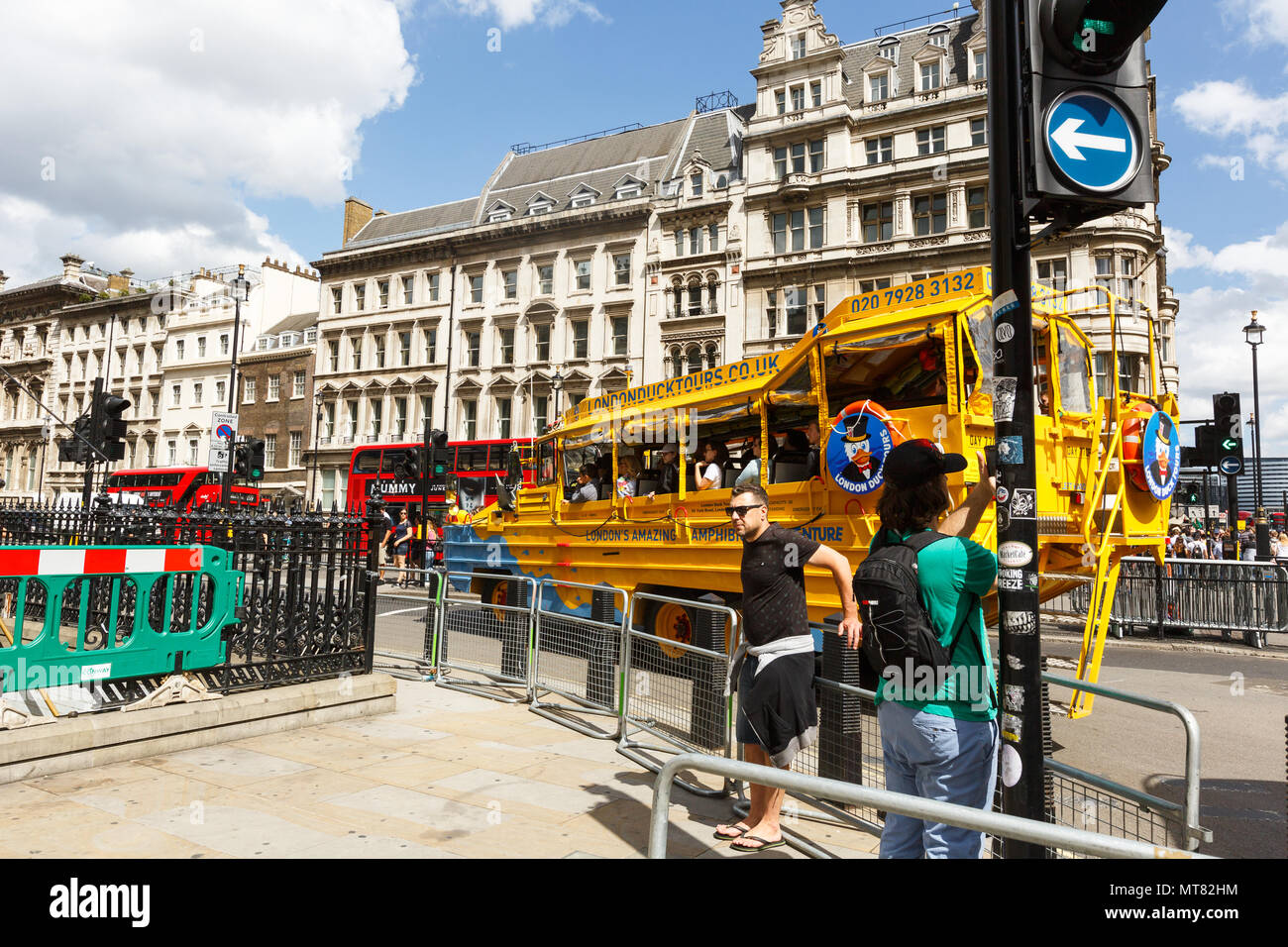 Legendary yellow Submarine stylized bus on the streets of London Stock ...