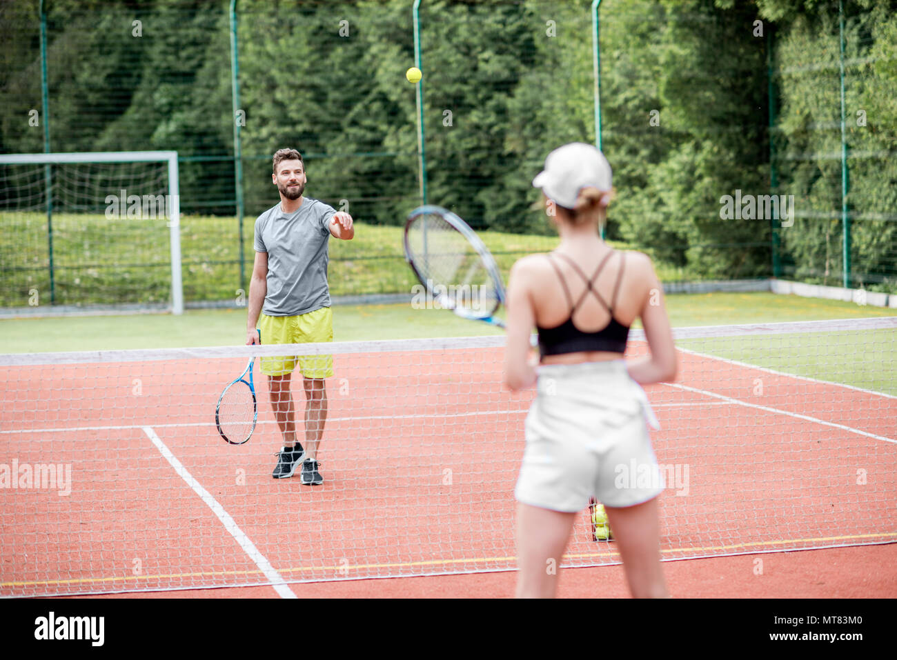 People playing tennis male hi-res stock photography and images - Alamy