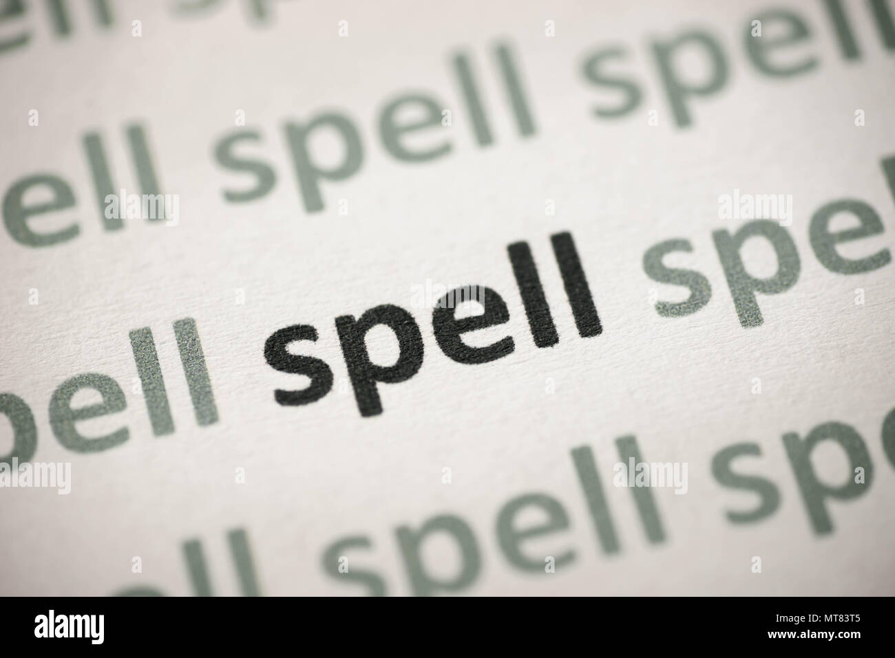 word spell printed on white paper macro Stock Photo - Alamy