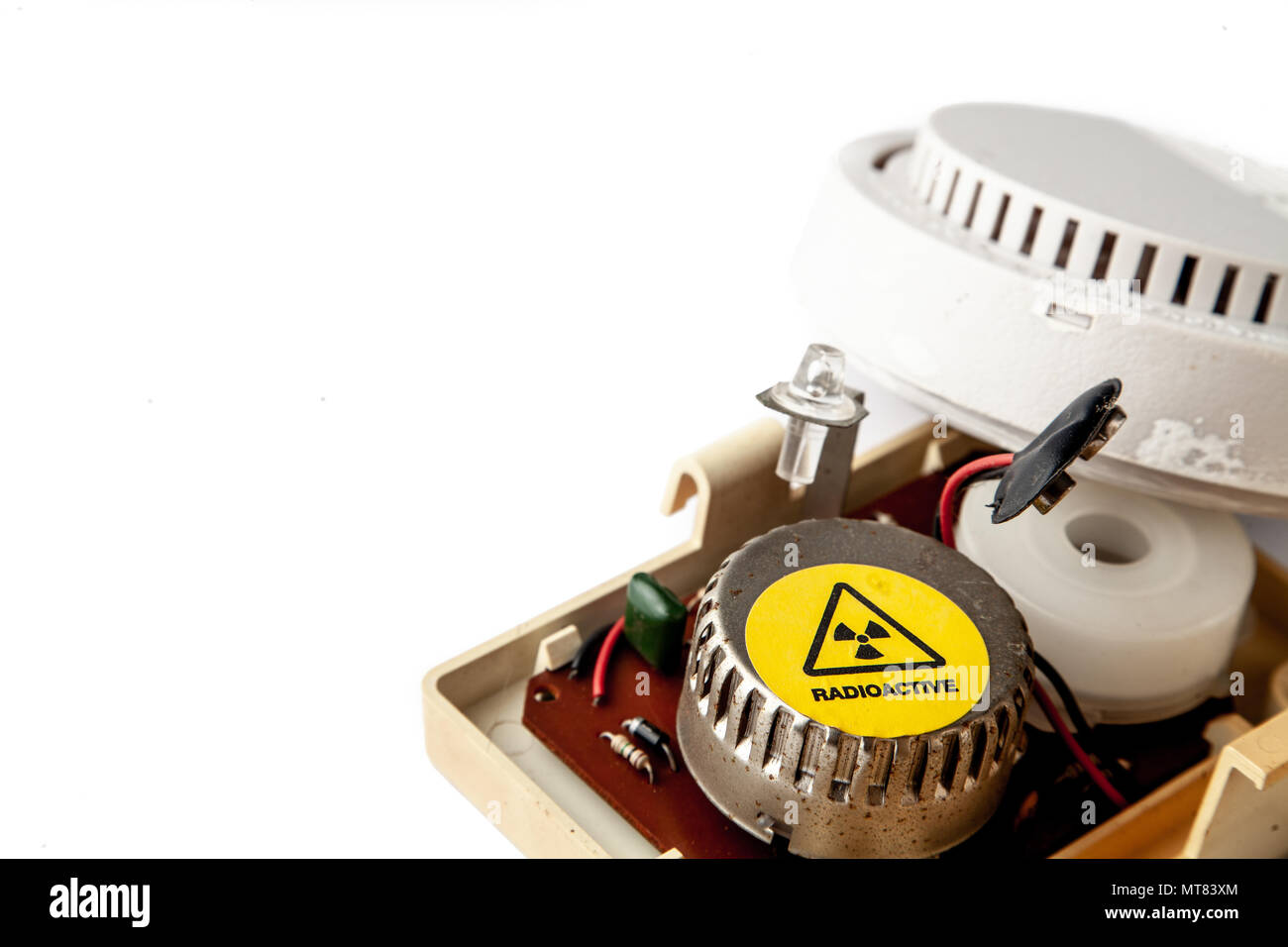 Old domestic smoke detector alarms on white background Stock Photo - Alamy