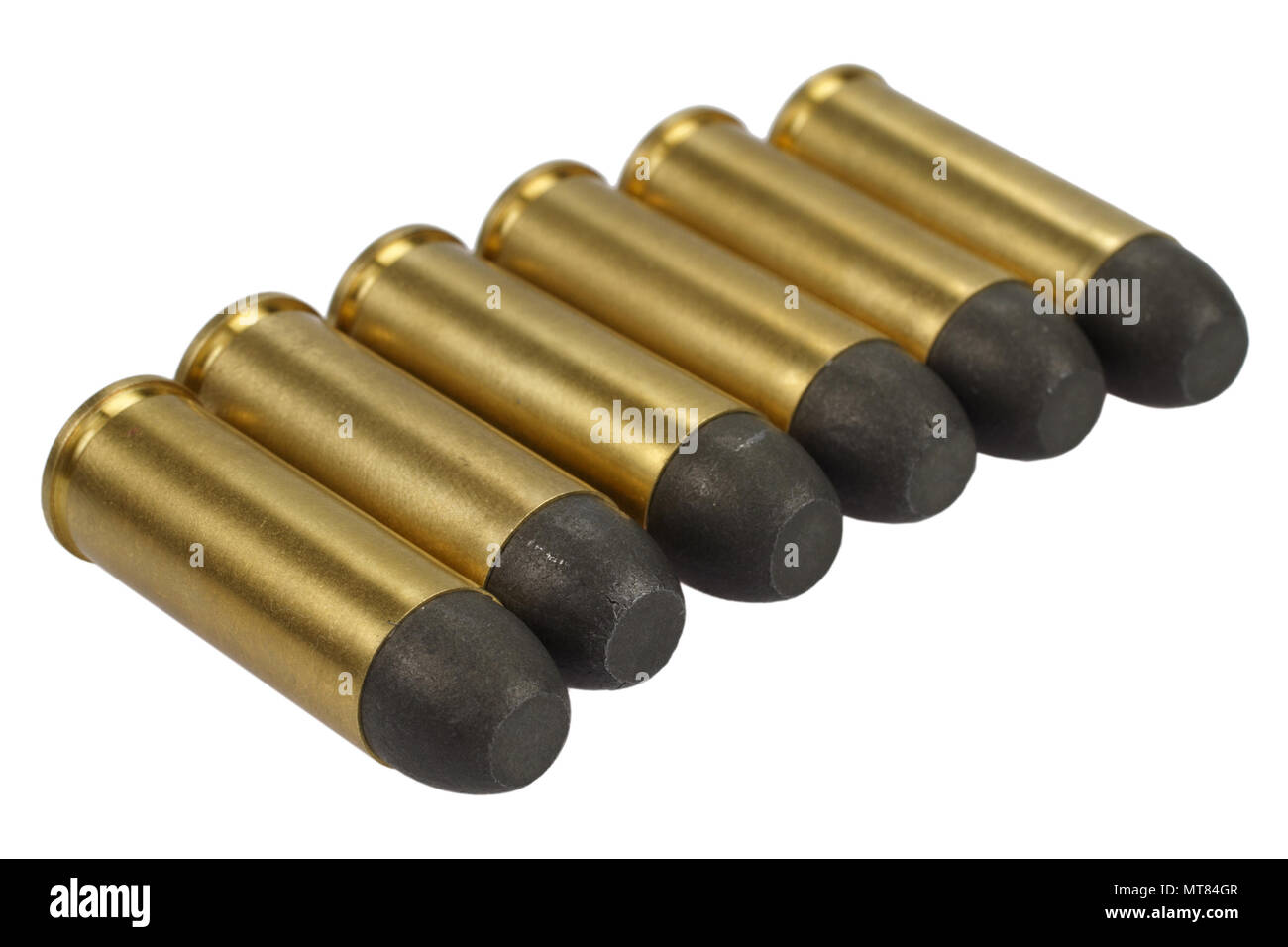 The .45 caliber revolver cartridges dating to 1873 isolated on white ...
