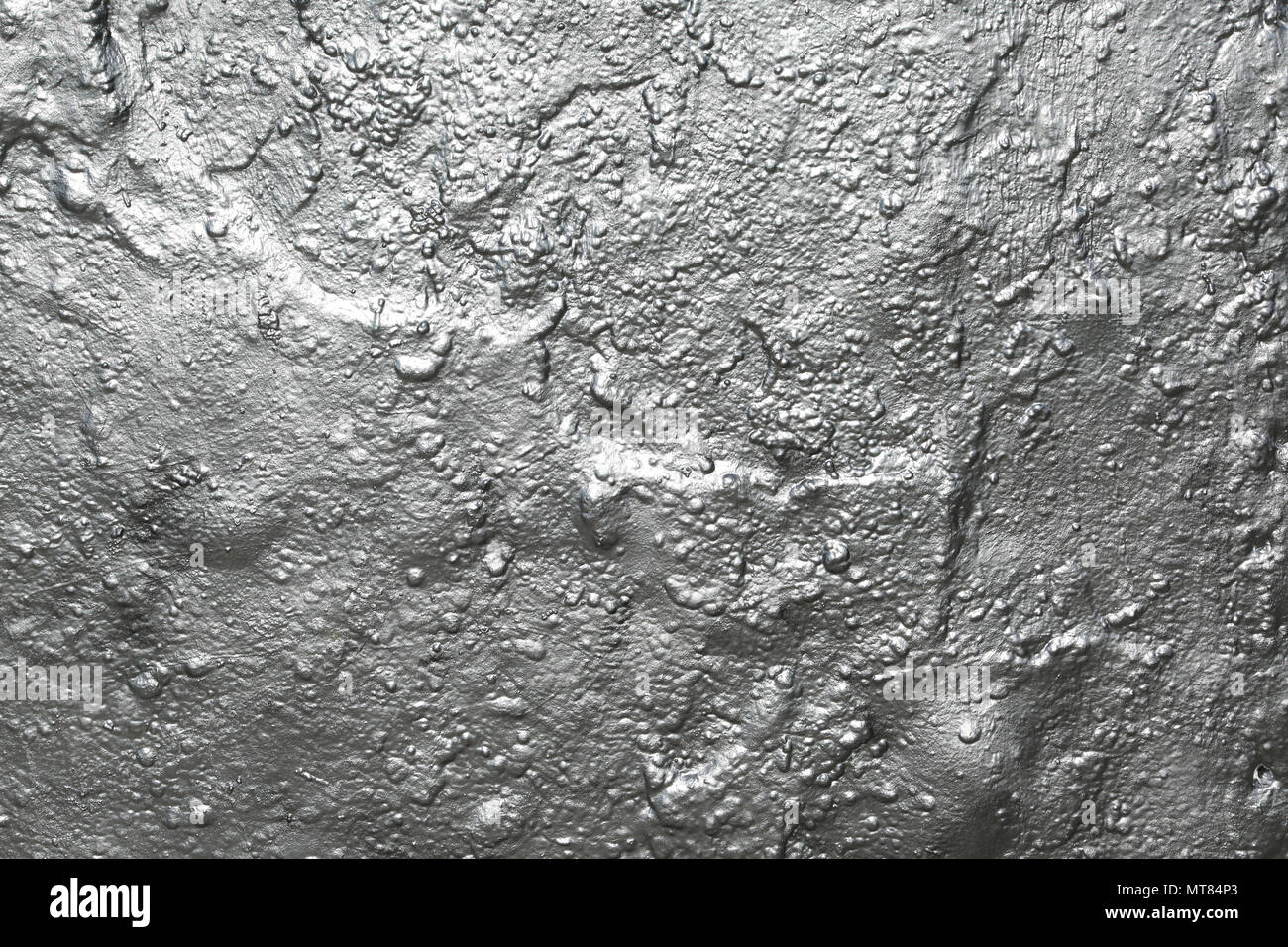 Shimmering silver background of a wall with gloss and silver paint ...