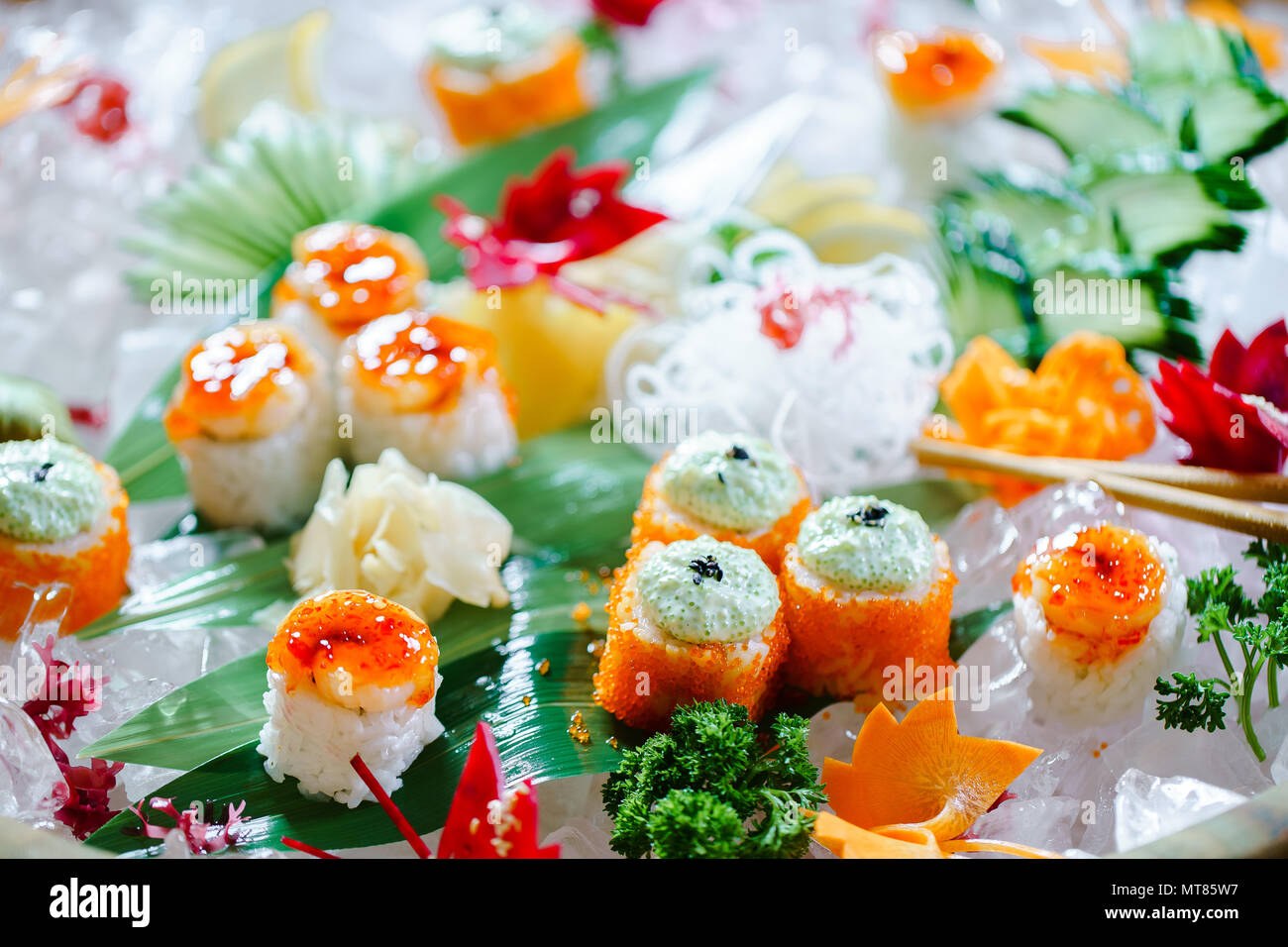 A lot of sushi rolls with different fillings. Shot of cooked classic ...