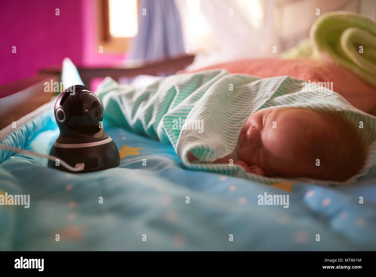 Surveillance camera help to check sleeping baby young parents Stock ...