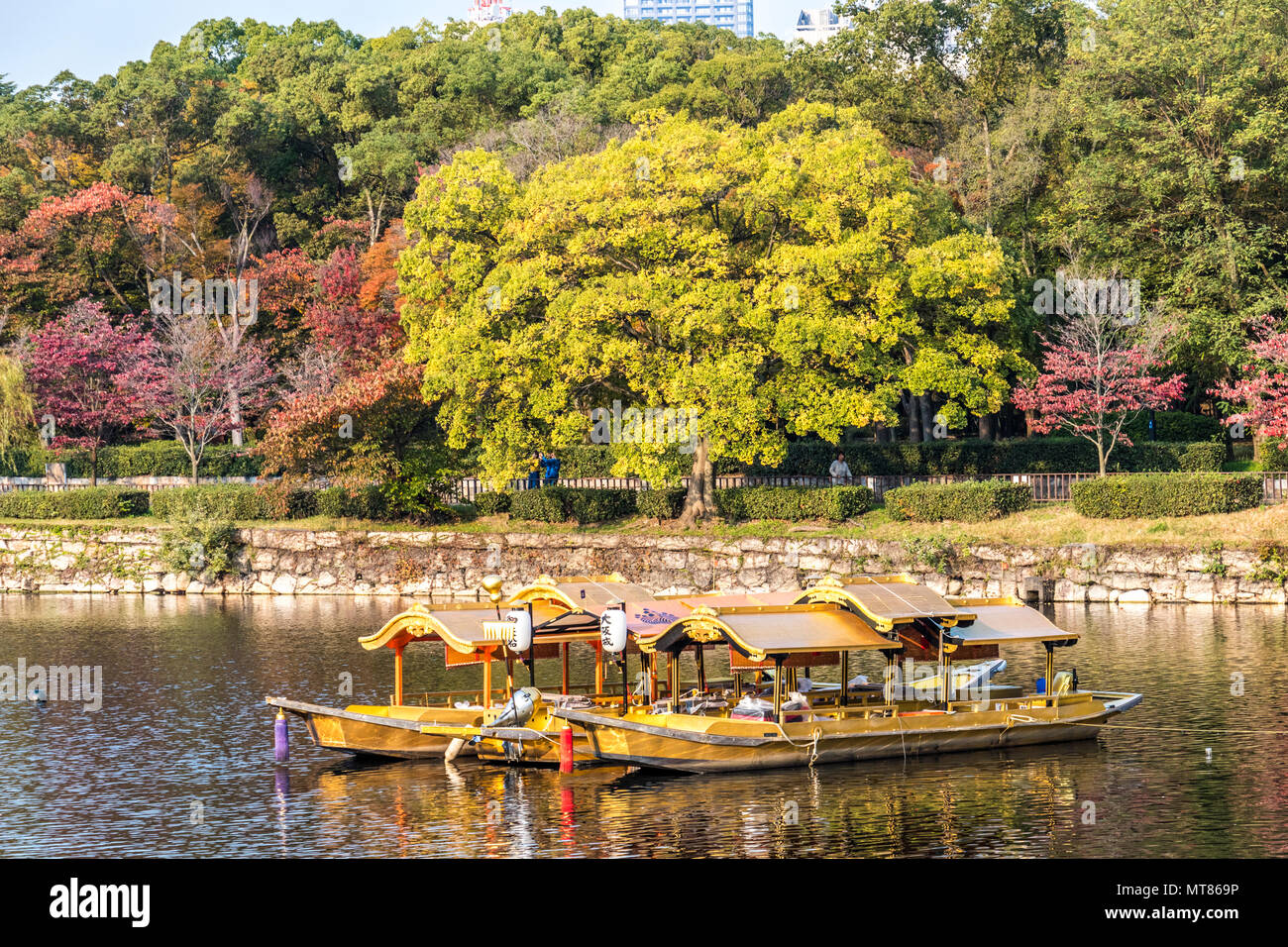 Boats in moat around Osaka Castle, in Osaka Castle Park Japan Stock ...