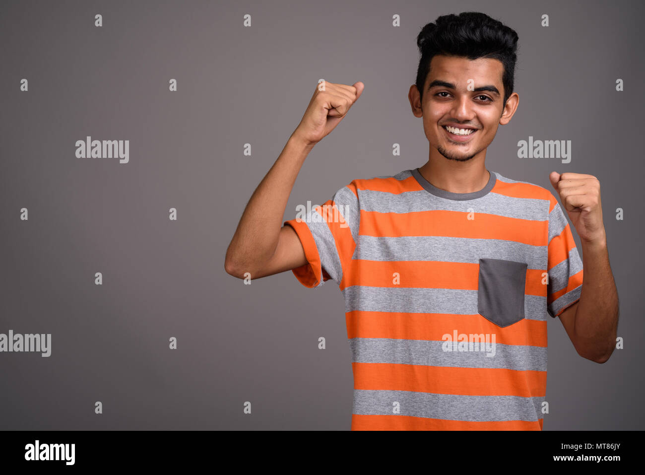Excited young indian man guy hi-res stock photography and images - Alamy