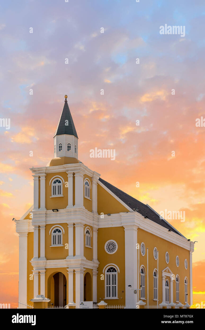 An old yellow and white plaster church on Curacao Stock Photo - Alamy