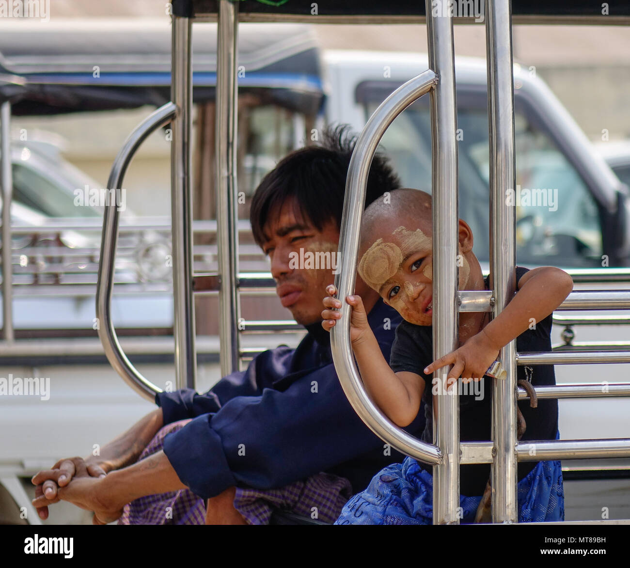 Mandalay, Myanmar - Feb 22, 2016. People sitting on local bus in ...