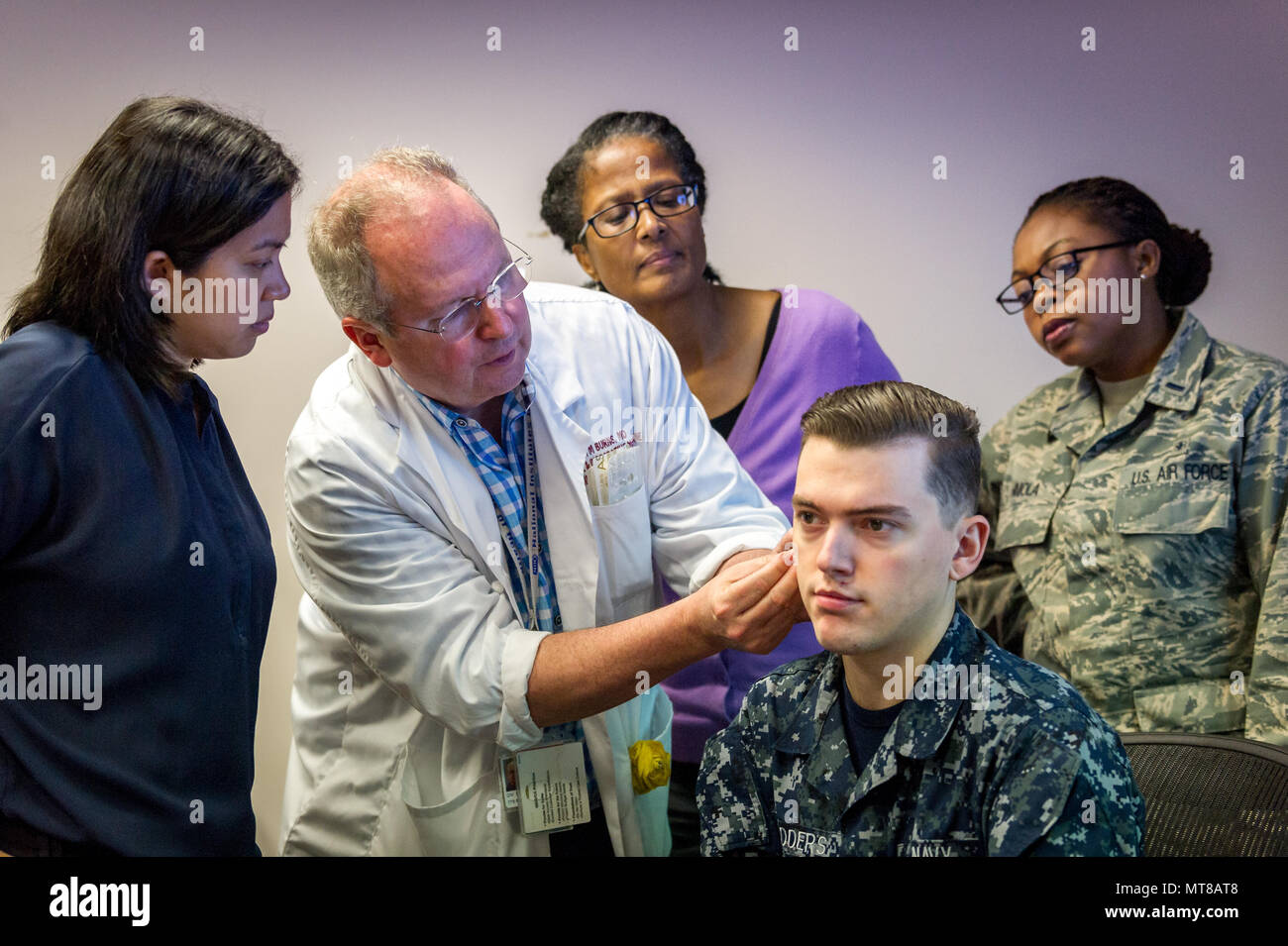 Former Air Force Colonel, Dr. Stephen Burns demonstrates the ...
