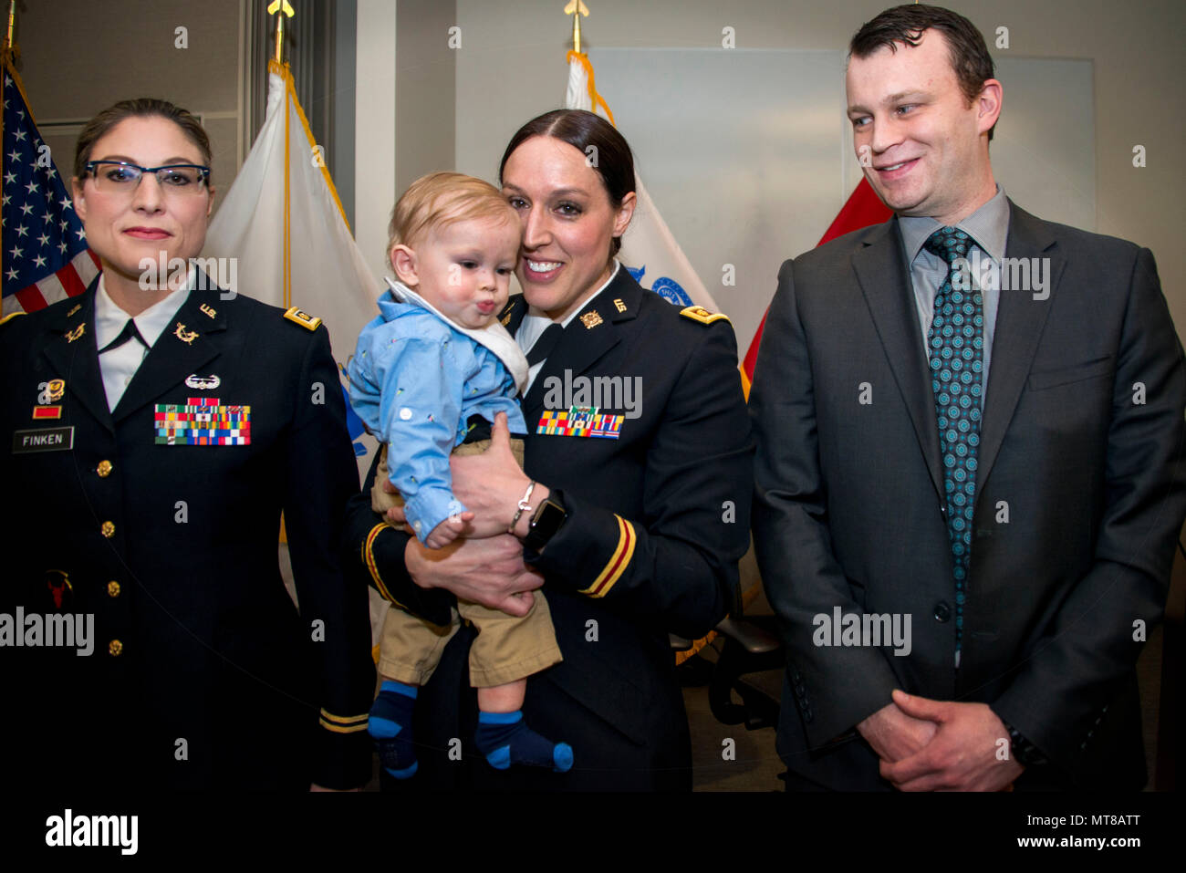 Iowa National Guard Maj. Jill Finkel (left) poses with her sister ...