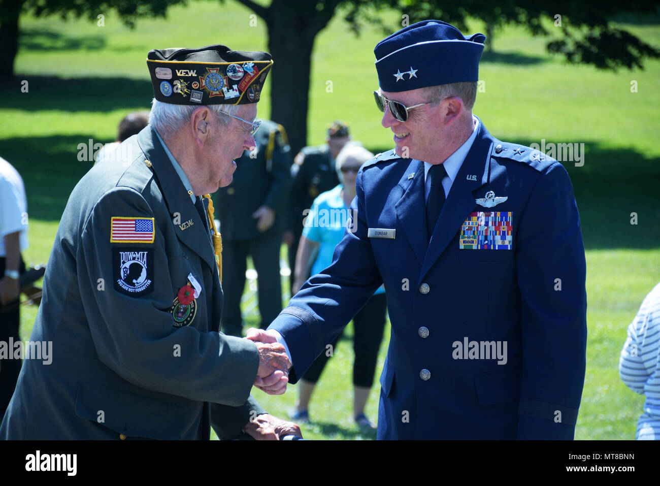 Maj. Gen. Don DUnbar, Wisconsin's adjutant general, shakes hands with a ...