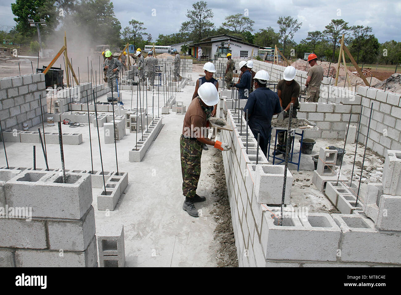 The 808th Engineer Company and their Belizean counterparts work ...