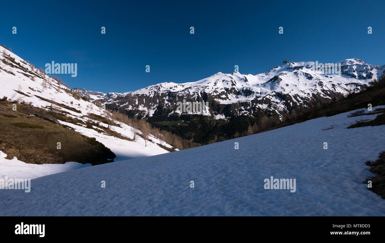 The Alps in springtime, sunny day snowy landscape ski resort, high ...