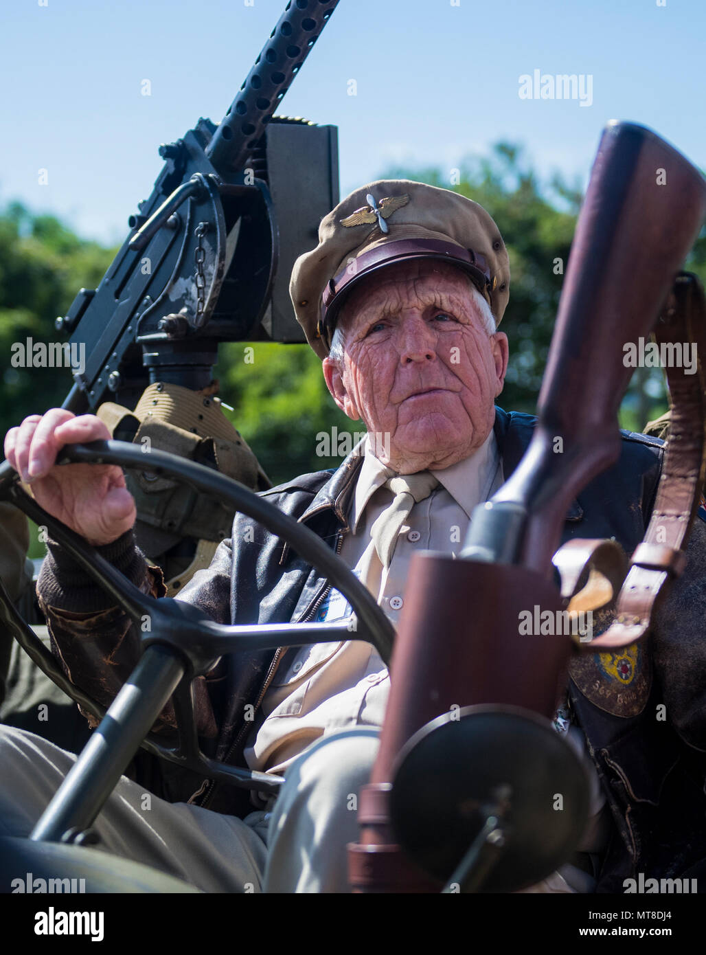 Douglas Ward, 305th Bombardment Group veteran, laughs at a joke made ...