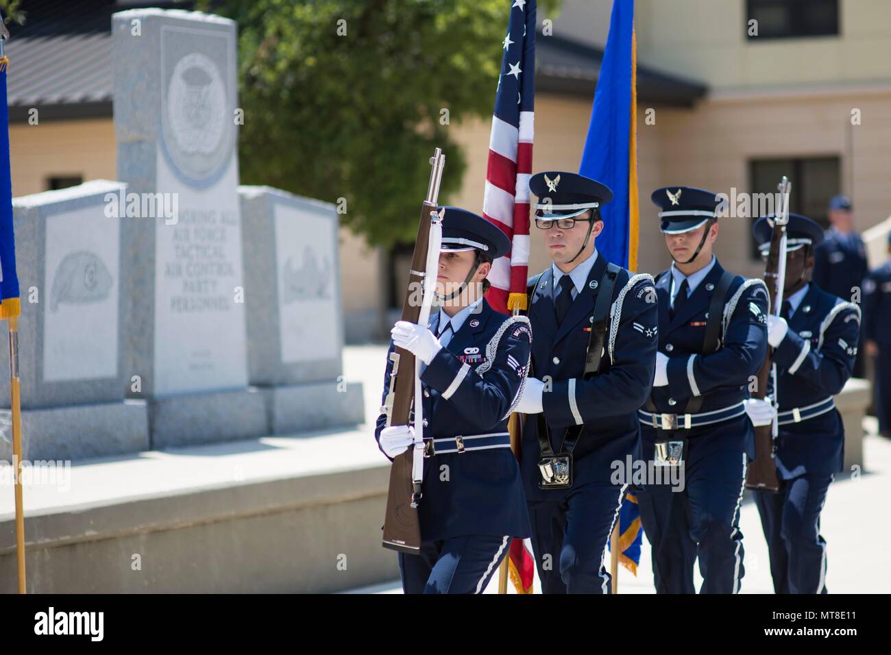 Members of the Joint Base San Antonio Honor Guard present the colors ...