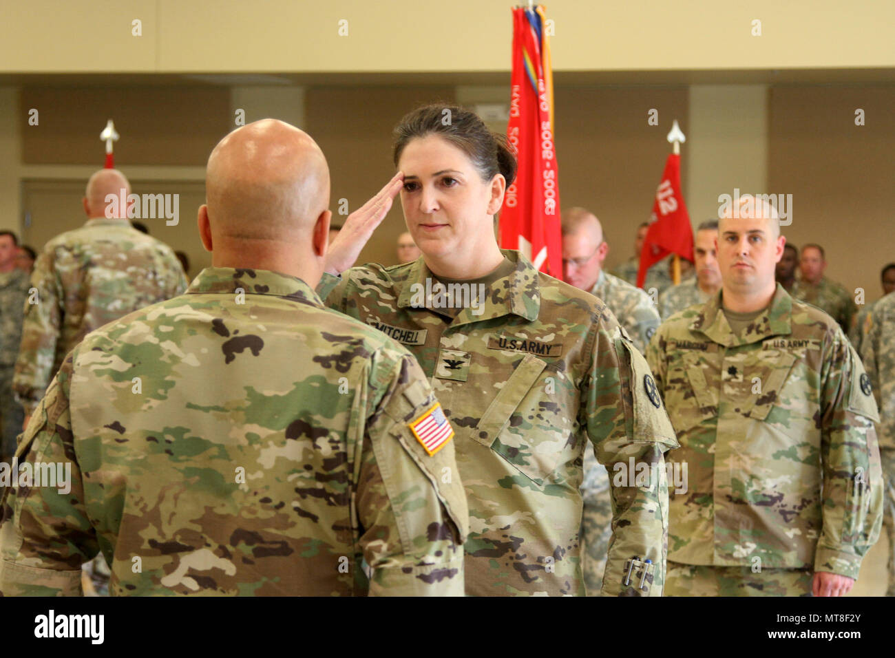 Col. Jennifer Mitchell (saluting) assumes command of the 16th Engineer ...
