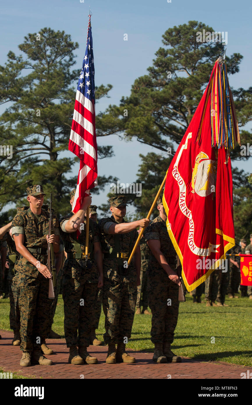 U.S. Marines with 2nd Marine Division (2d MARDIV) present the colors ...