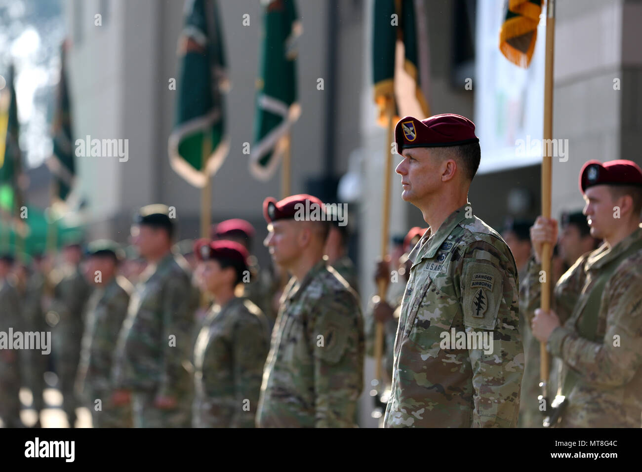 Group commanders and guidon-bearers stand at attention during the 1st ...