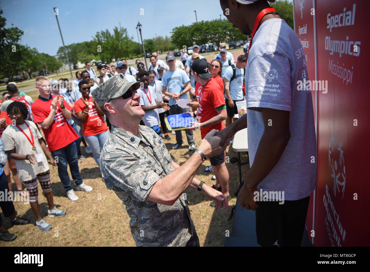 Lt. Col. Michael Manning, Training Group deputy commander, present a ...