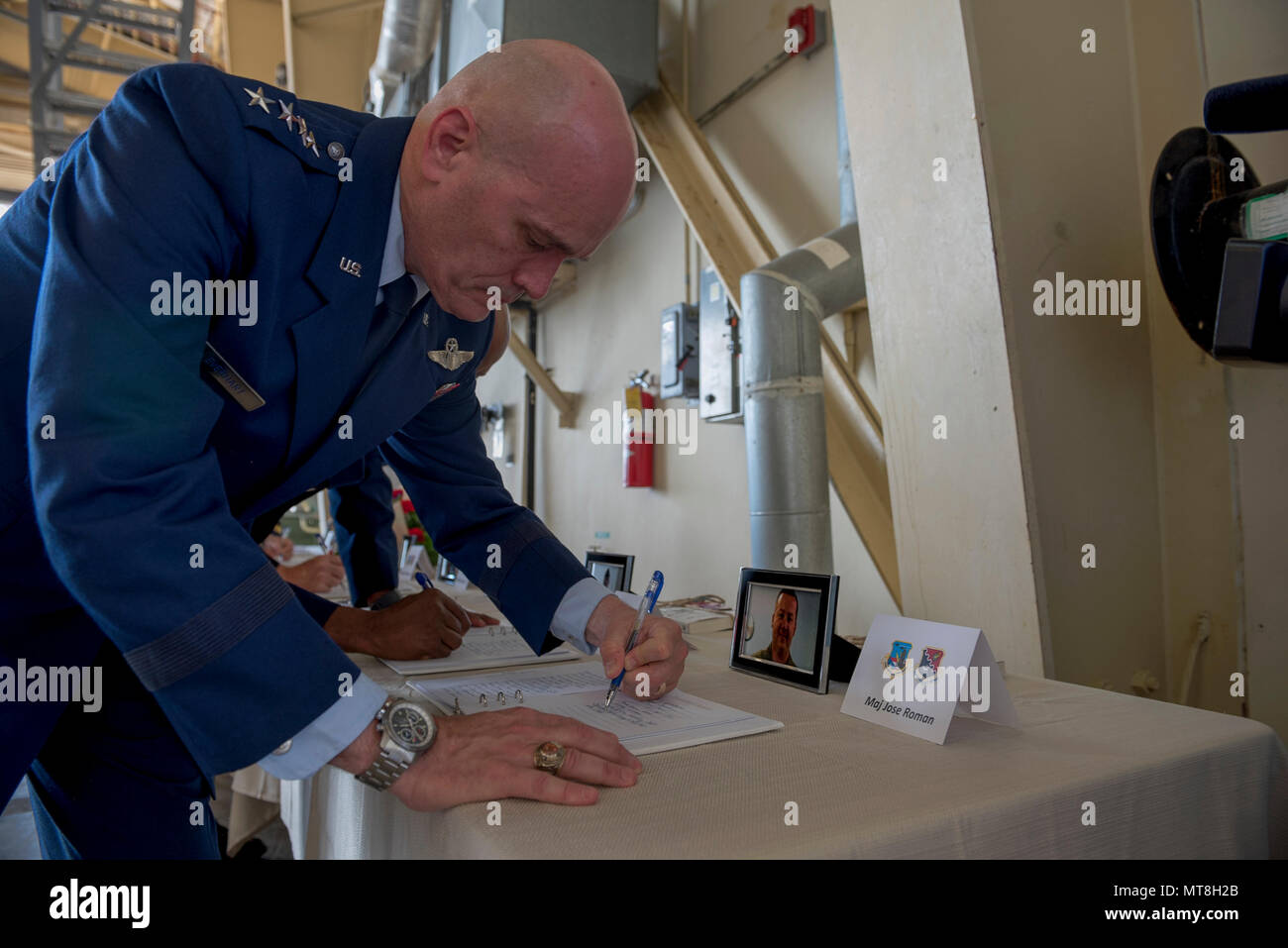 Gen. Carlton D. Everhart II, Commander, Air Mobility Command, signs ...