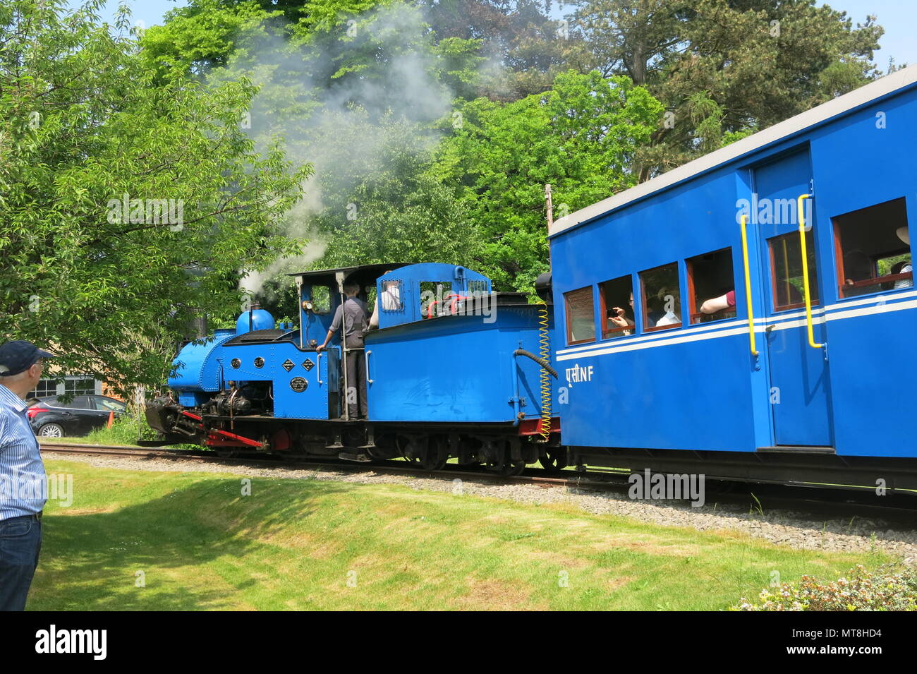 A bright blue steam engine on the garden railway at Adrian Shooter's ...
