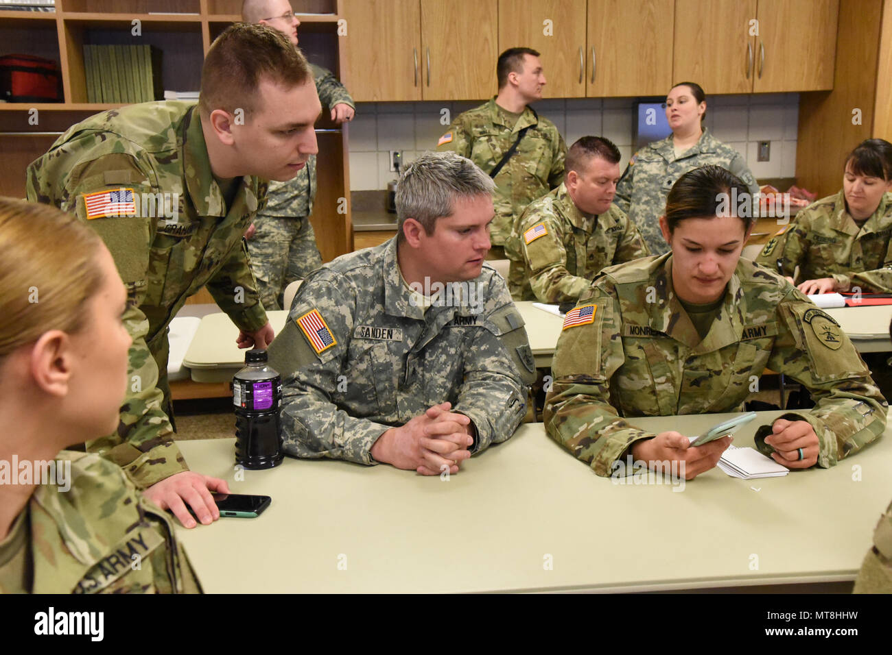From left to right at table, U.S. Army Spc. Cody Graham, of the 116th ...
