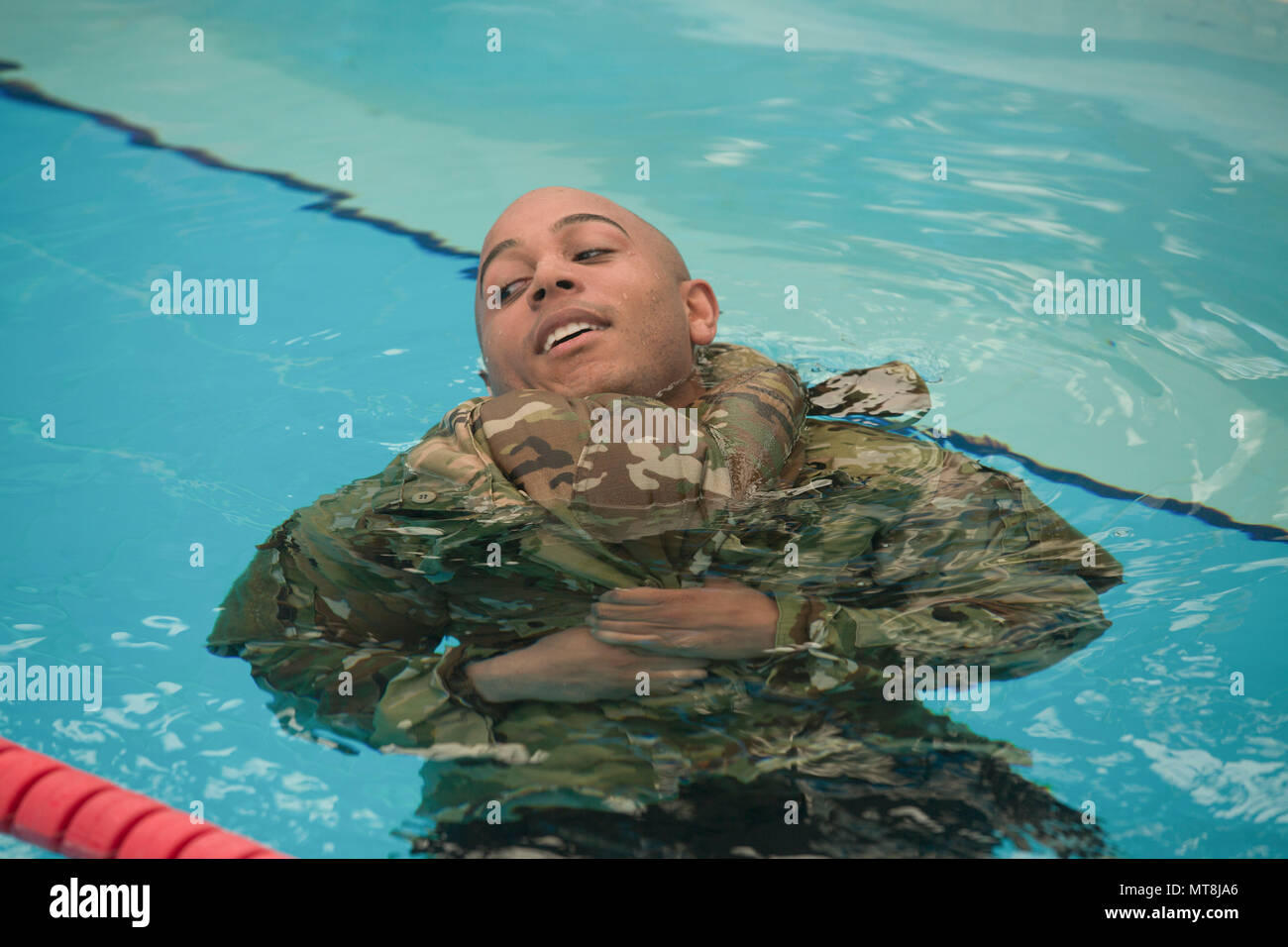 U.S. Army Staff Sgt. Maurice Wilson, assigned to Eighth Army, Camp Humphreys, uses his trousers ...
