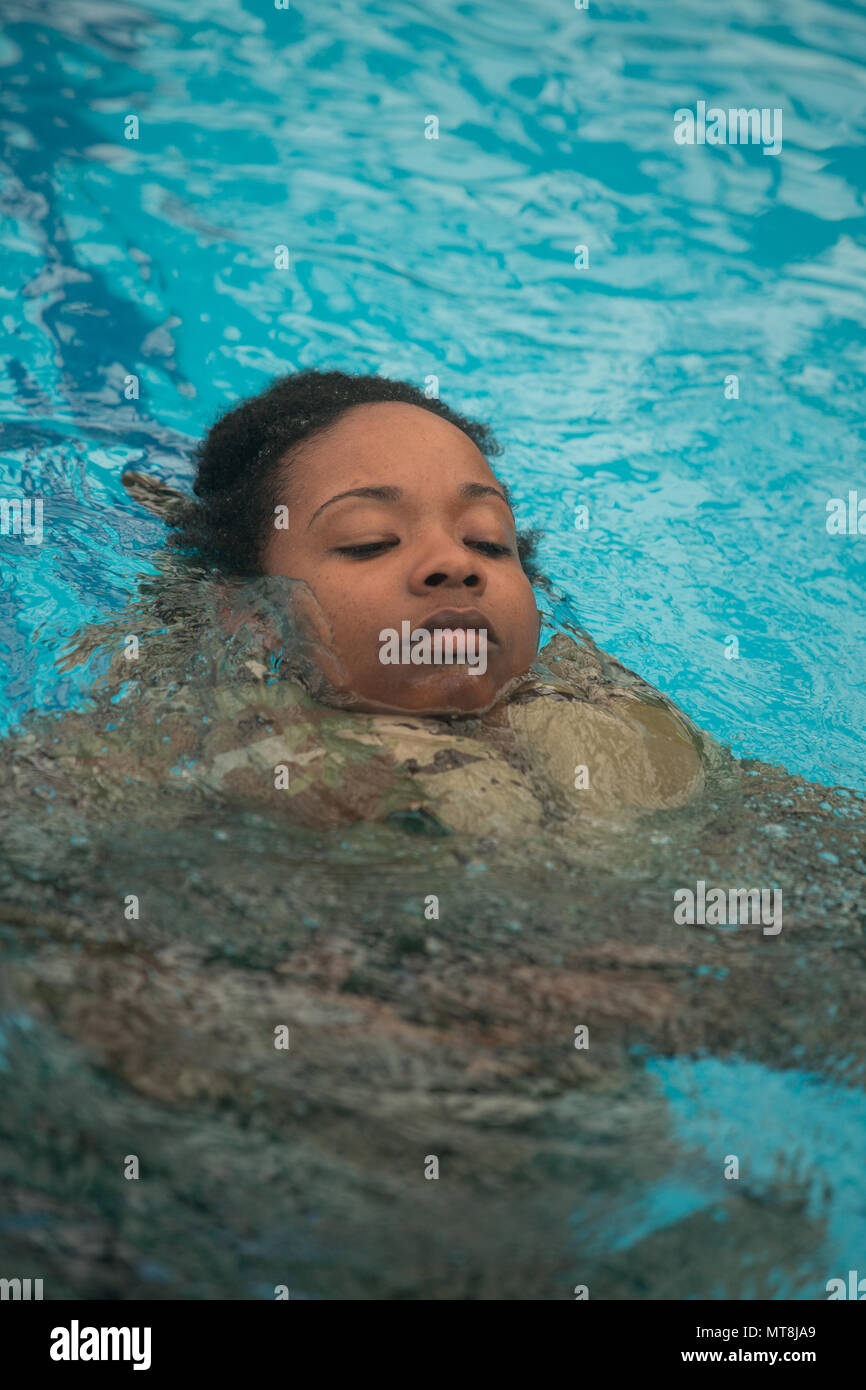 U.S. Army Sgt. Erika Bustamente, assigned to the 65th Medical Brigade ...