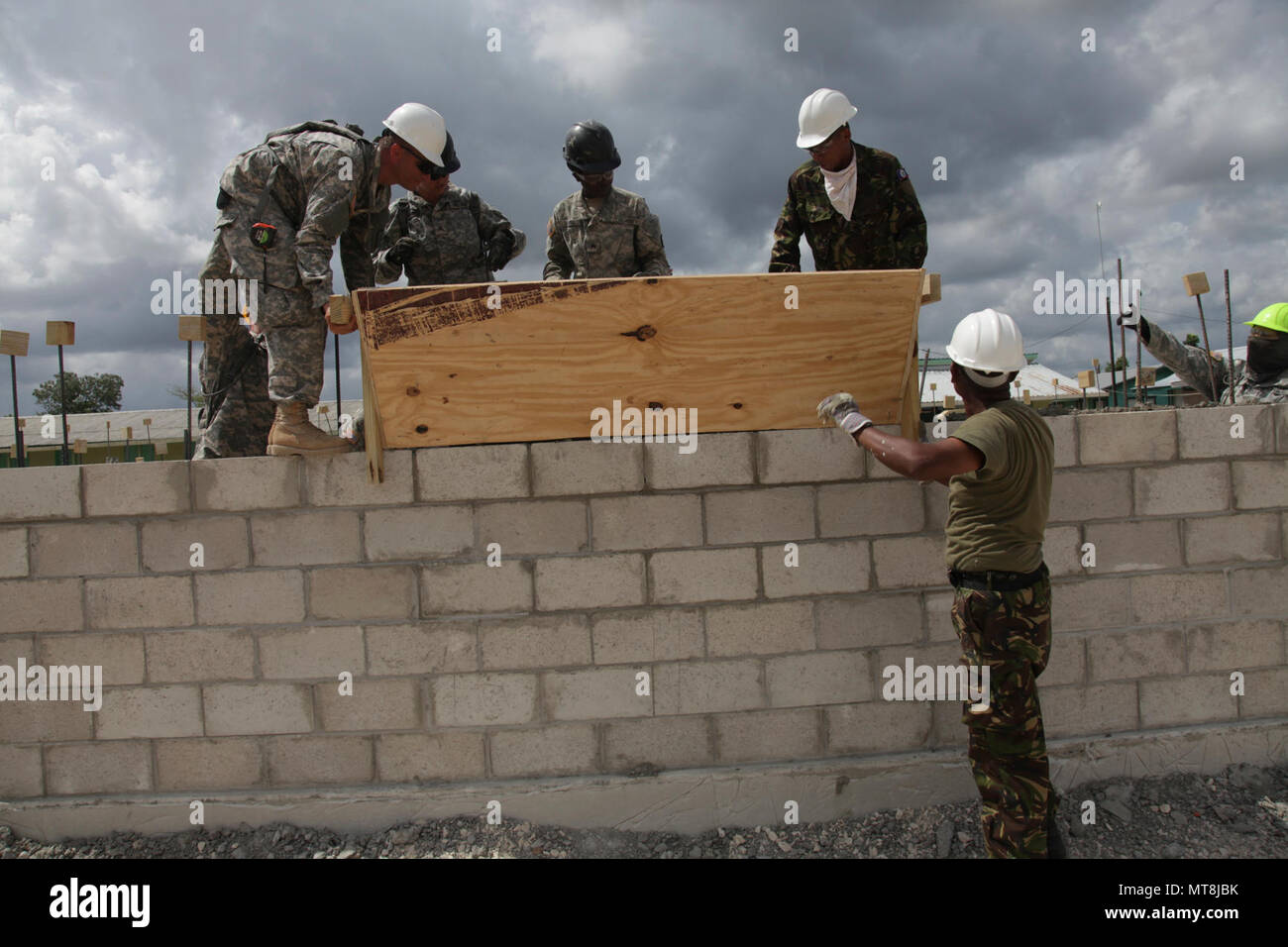 Soldiers with the 808th Engineer Company and Belize Defense Force place ...
