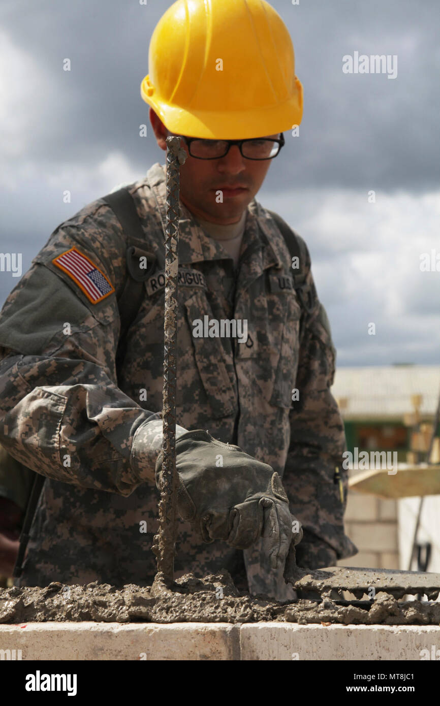 U.S. Army Pvt. 1st Class Emilio Rodriguez, with the 808th Engineer ...