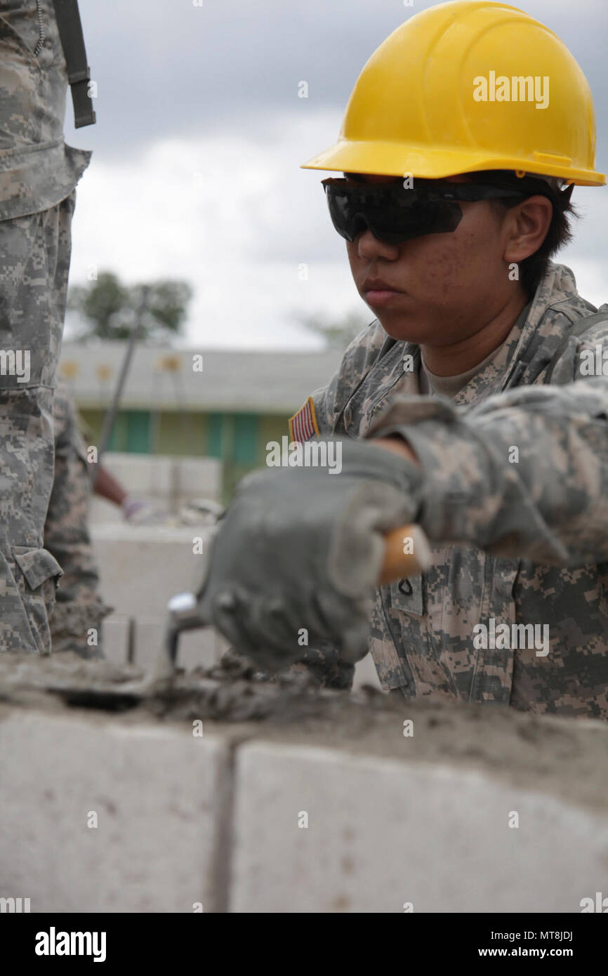 U.S. Army Pvt. 1st Class Ashlie Lunna, with the 808th Engineer Company ...