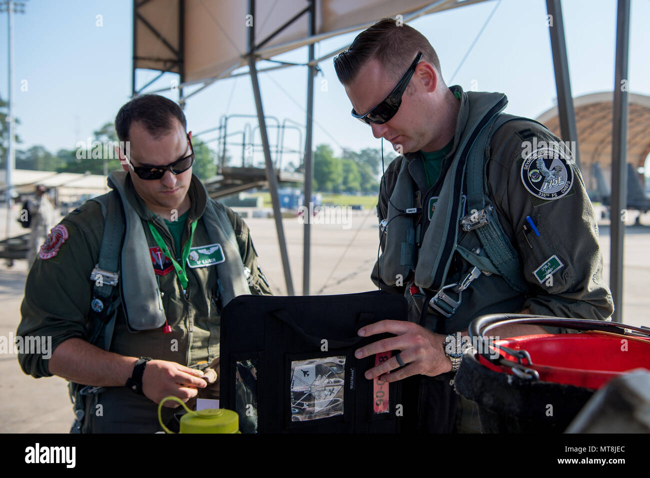 Capt. Bowman (right), 335th Fighter Squadron pilot, and 1st Lt. Kaiser ...