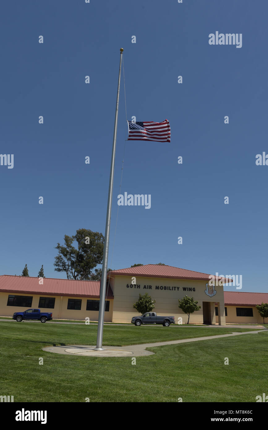 The American flag flies at half-staff outside 60th Air Mobility Wing ...