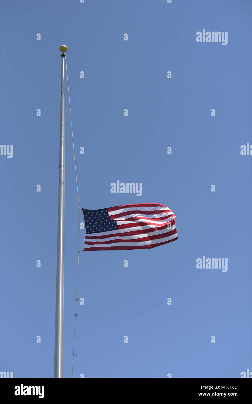 The American flag flies at half-staff outside 60th Air Mobility Wing ...