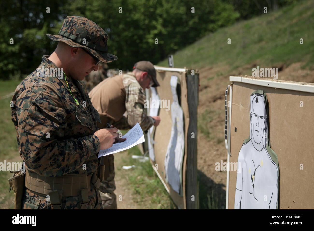 U.S. Marine Cpl. Michael C. Thweatt, fireteam leader with Bridge ...