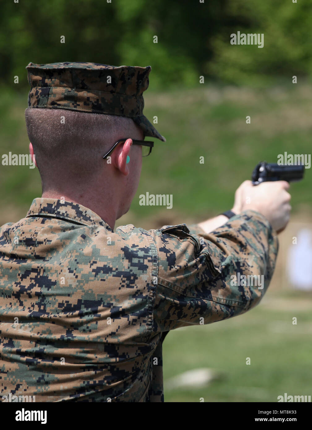 U.S. Marine Lance Cpl. Ryan W. Carlson, field radio operator with ...