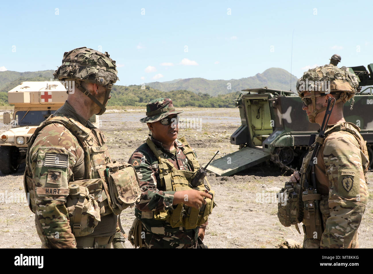 From left, U.S. Army Lt. Col. James Hart, commander of 1st Battalion ...