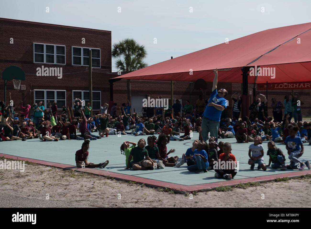 180511-N-OW019-0094 TAMPA, Fla. (May 11, 2018) Teachers and students at ...