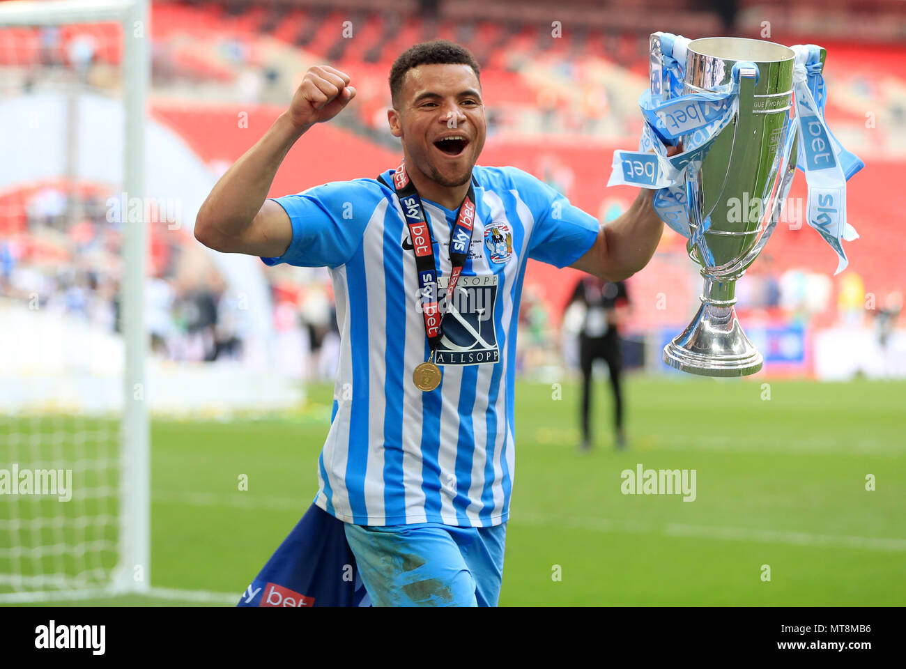 Coventry City's Maxime Biamou celebrates after the Sky Bet League Two ...